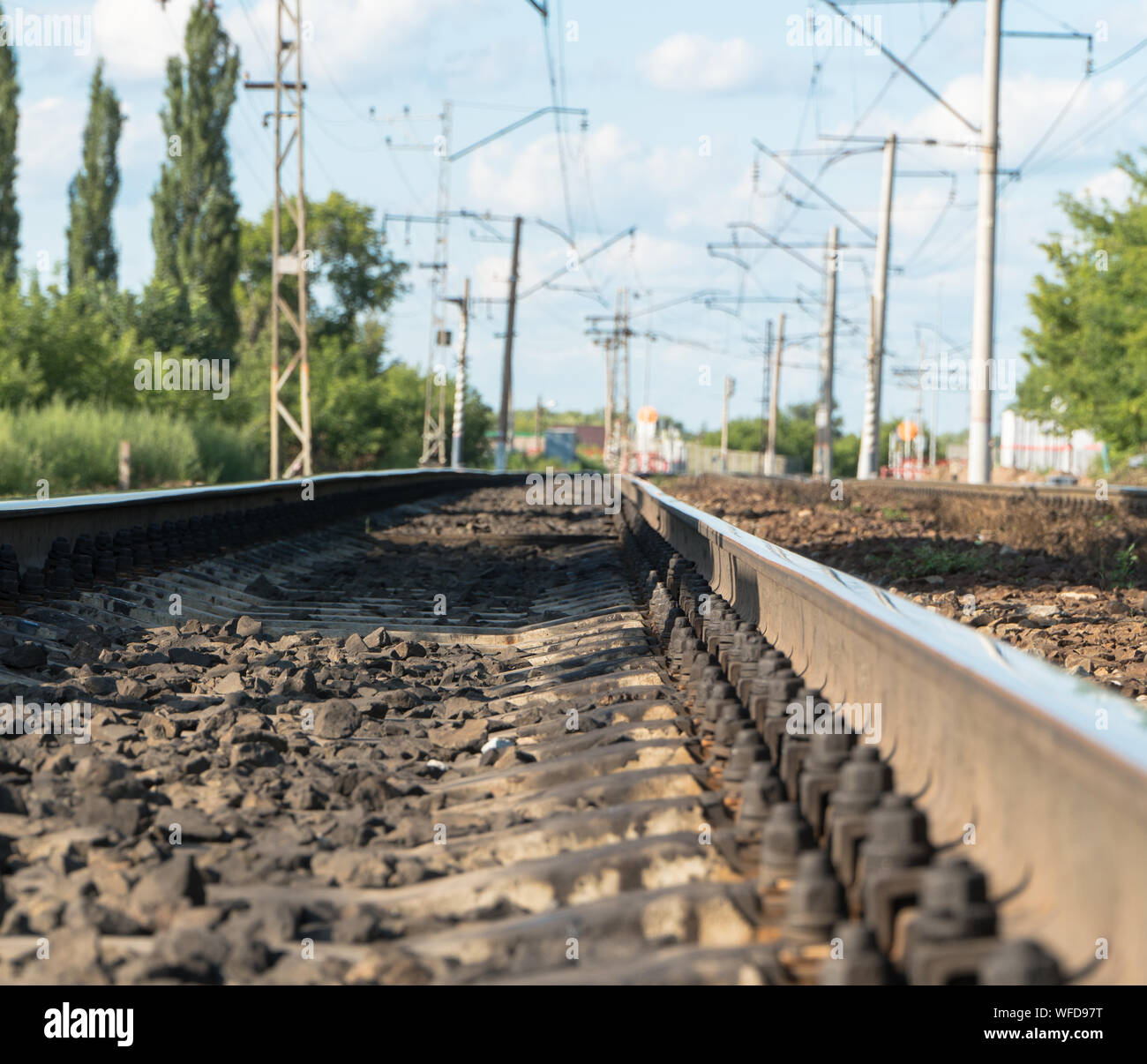 long railroad tracks with landscape against the sky Stock Photo - Alamy
