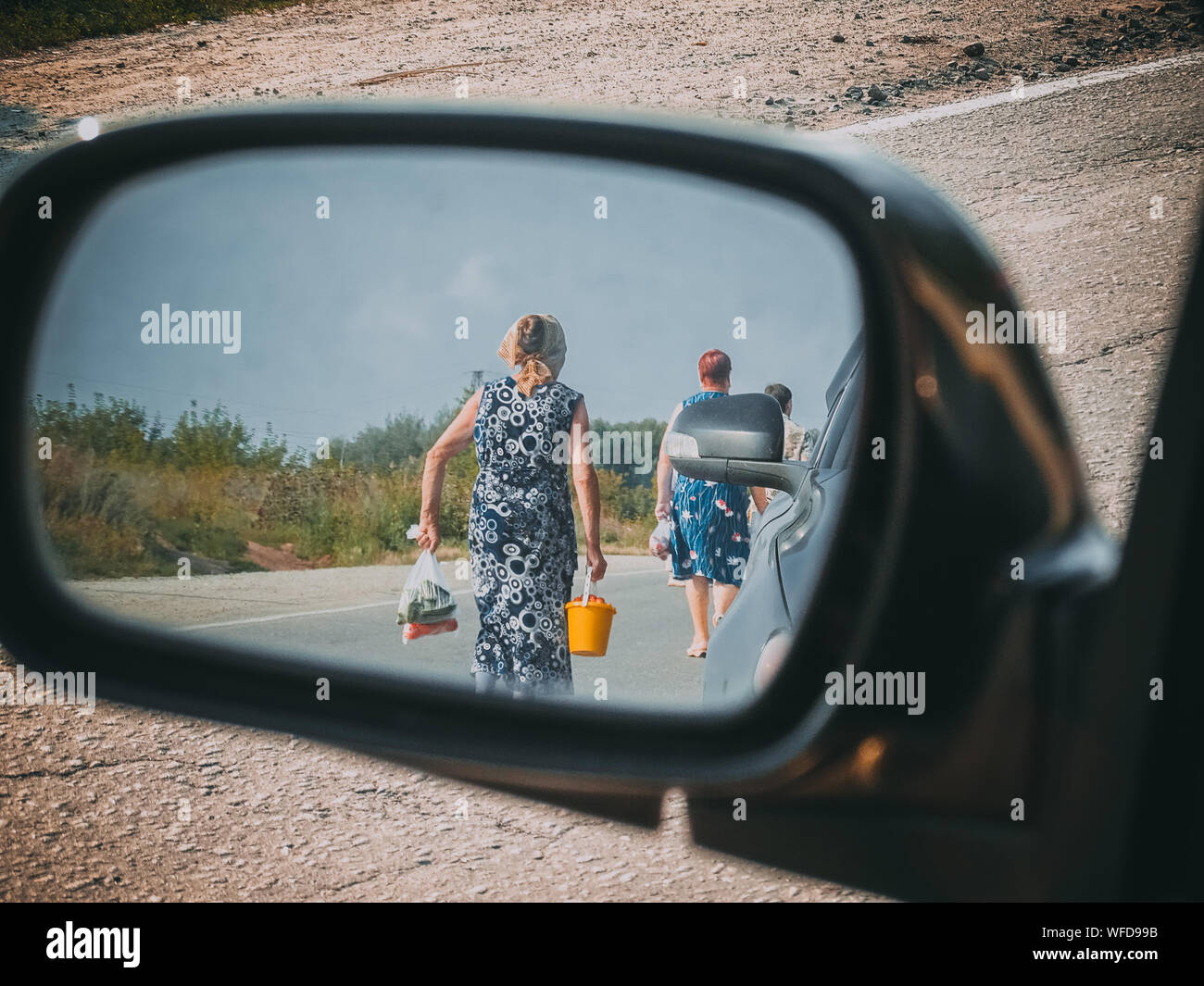 Mirror reflection on people walking hi-res stock photography and images ...