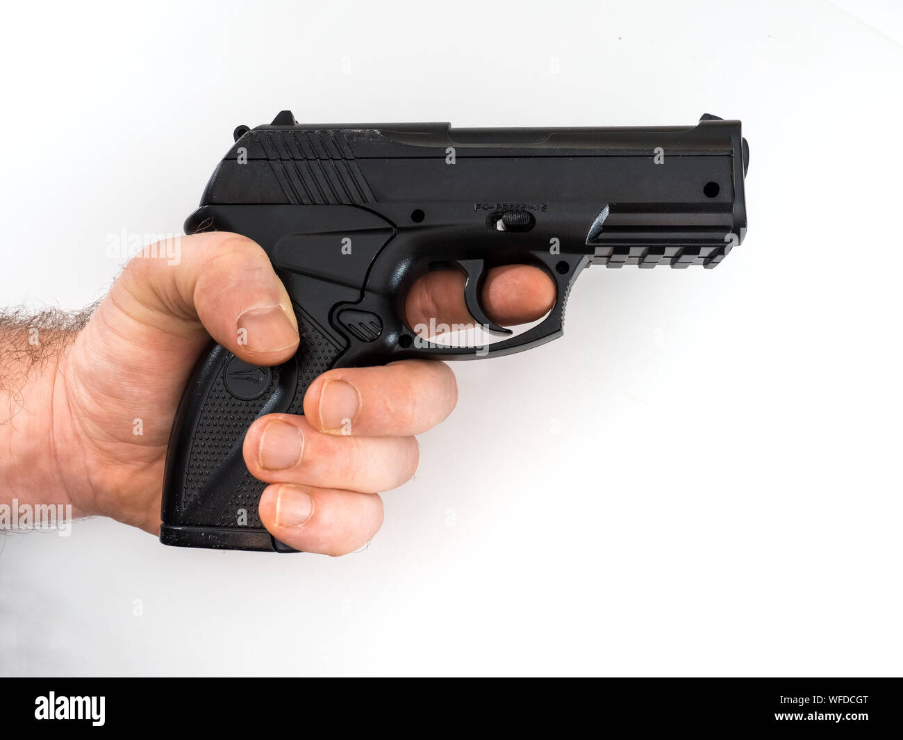 Hand holding toy gun hi-res stock photography and images - Alamy