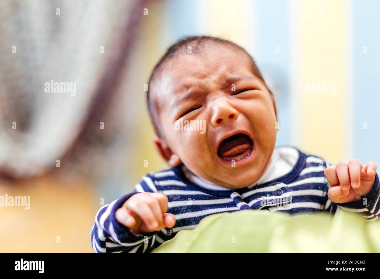 Baby Lying Down Crying High Resolution Stock Photography and Images - Alamy