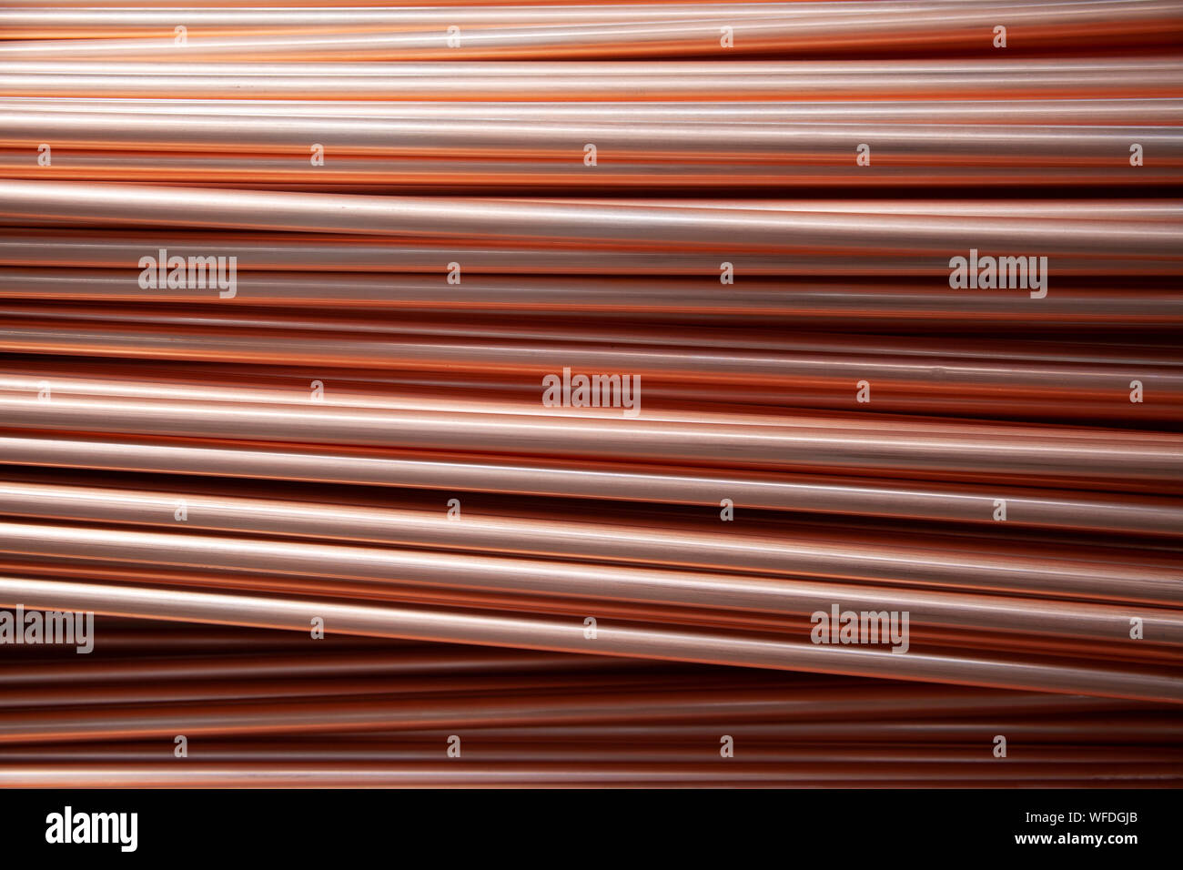 Copper pipes in factory, industrial background Stock Photo - Alamy