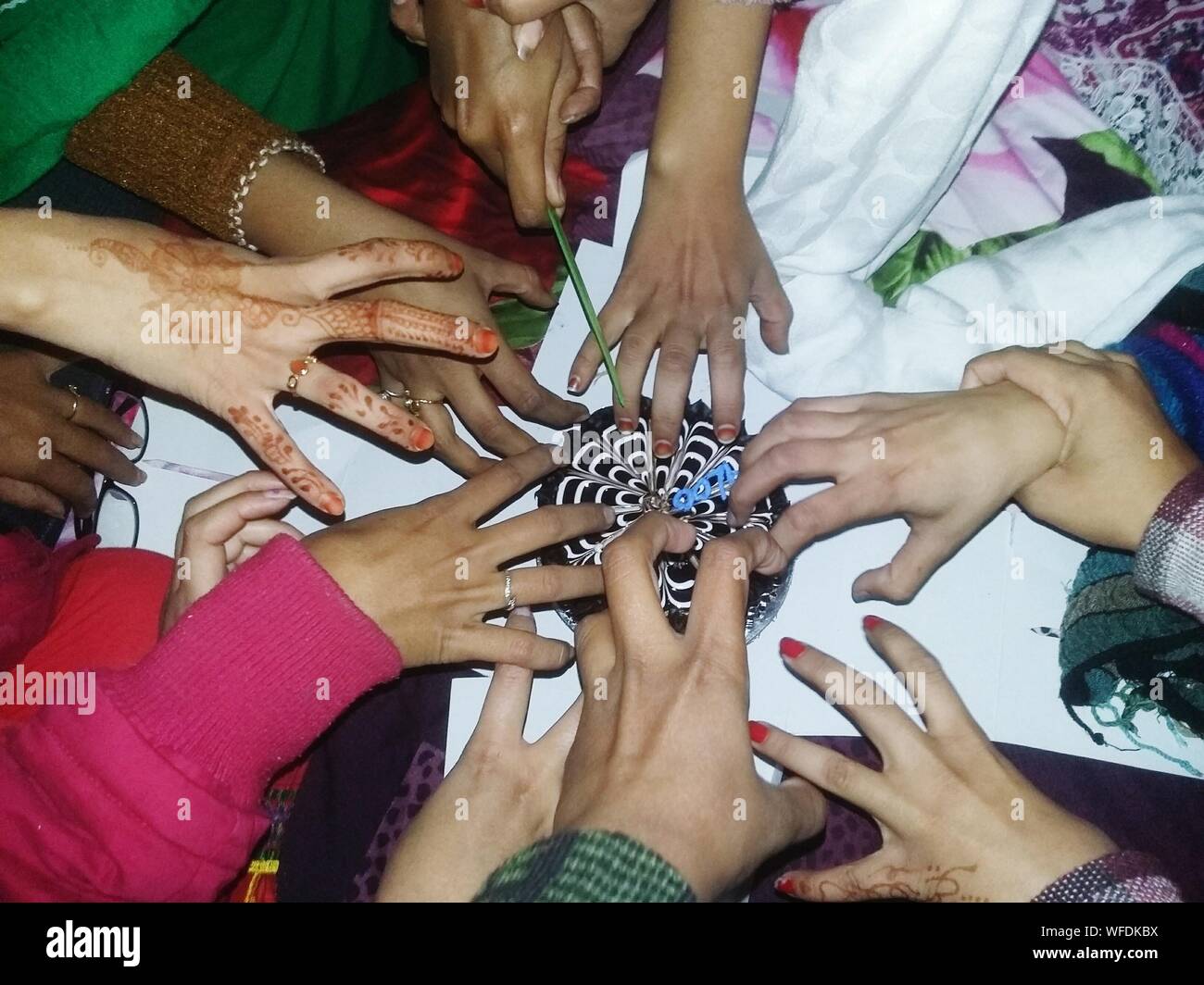 Reaching for cake hi-res stock photography and images - Alamy