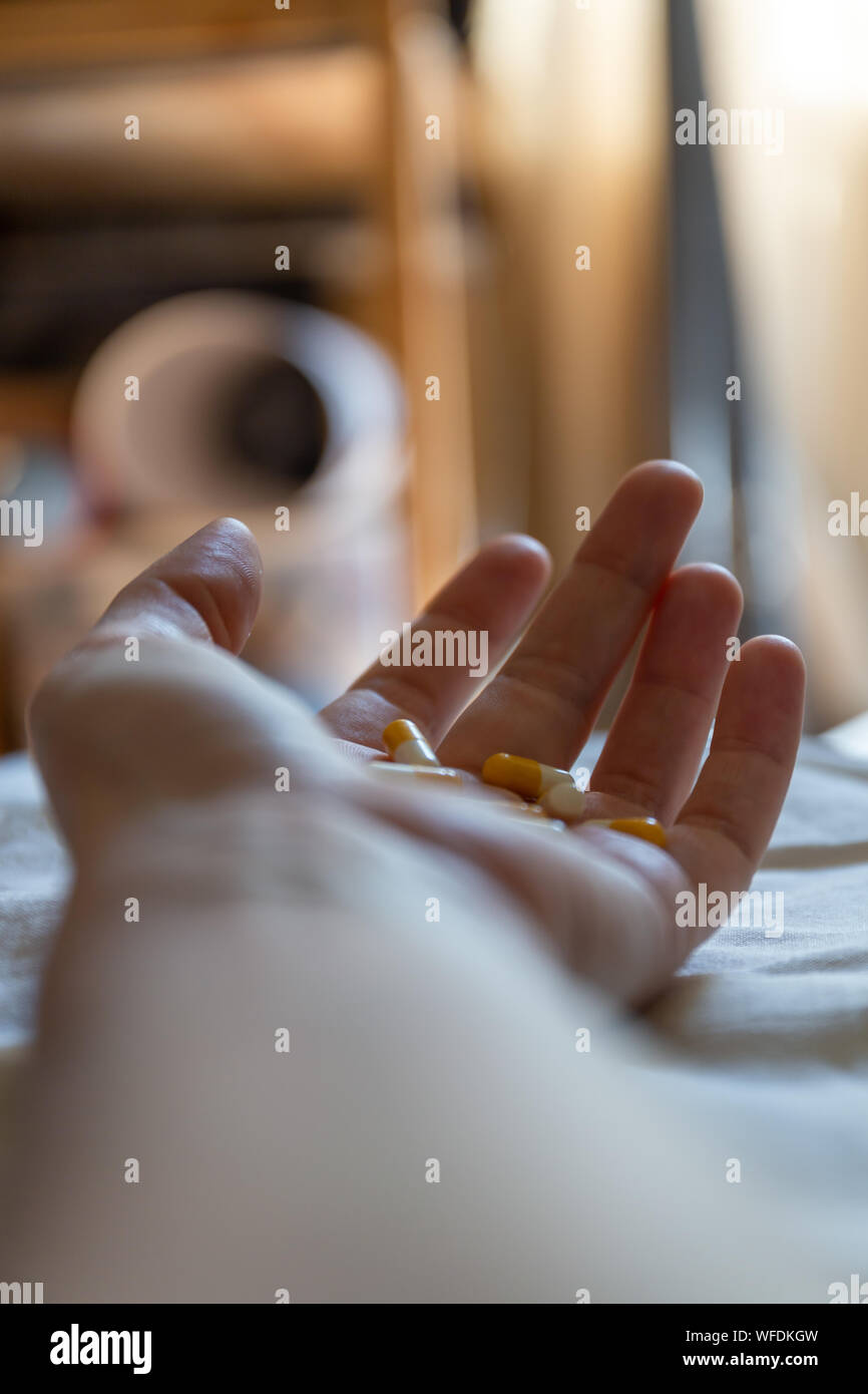 Close up hand of woman overdosing on medication. Close up of overdose ...