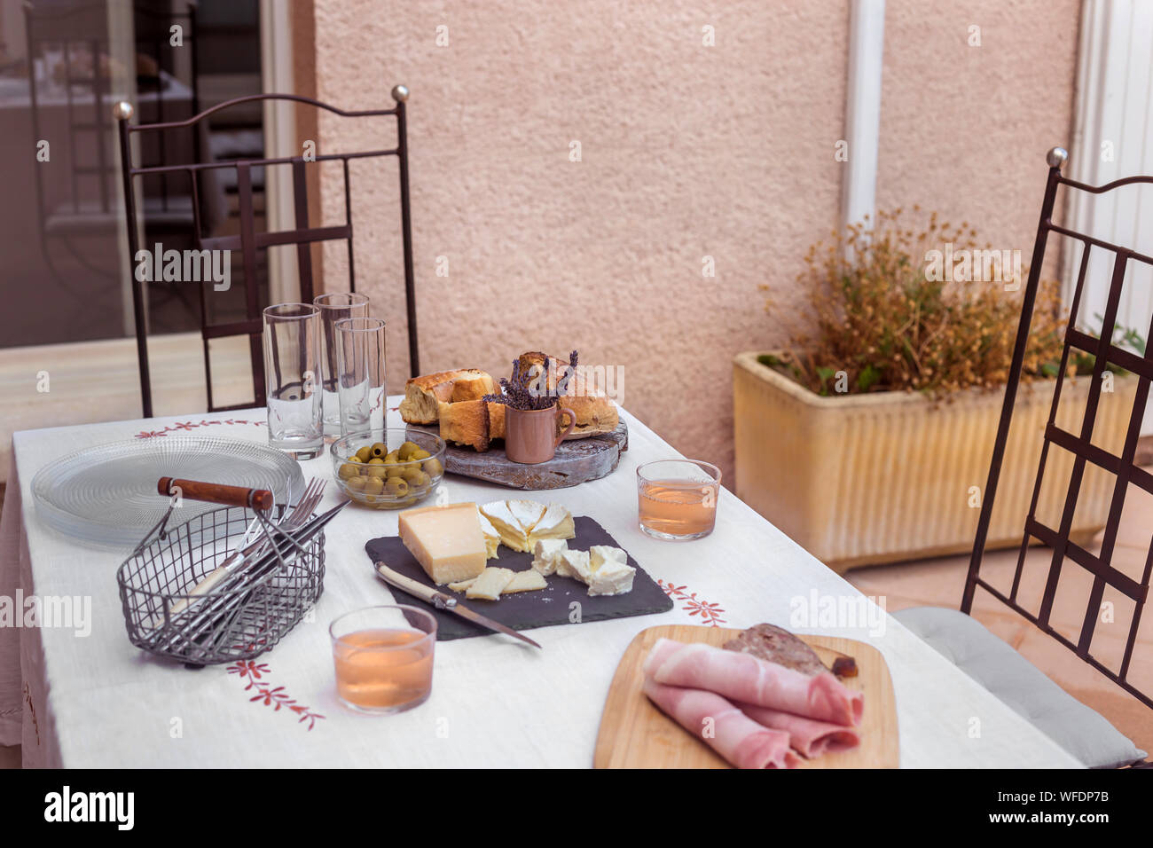 served dinner table homemade dishes cooked vegetables and appetizers ...