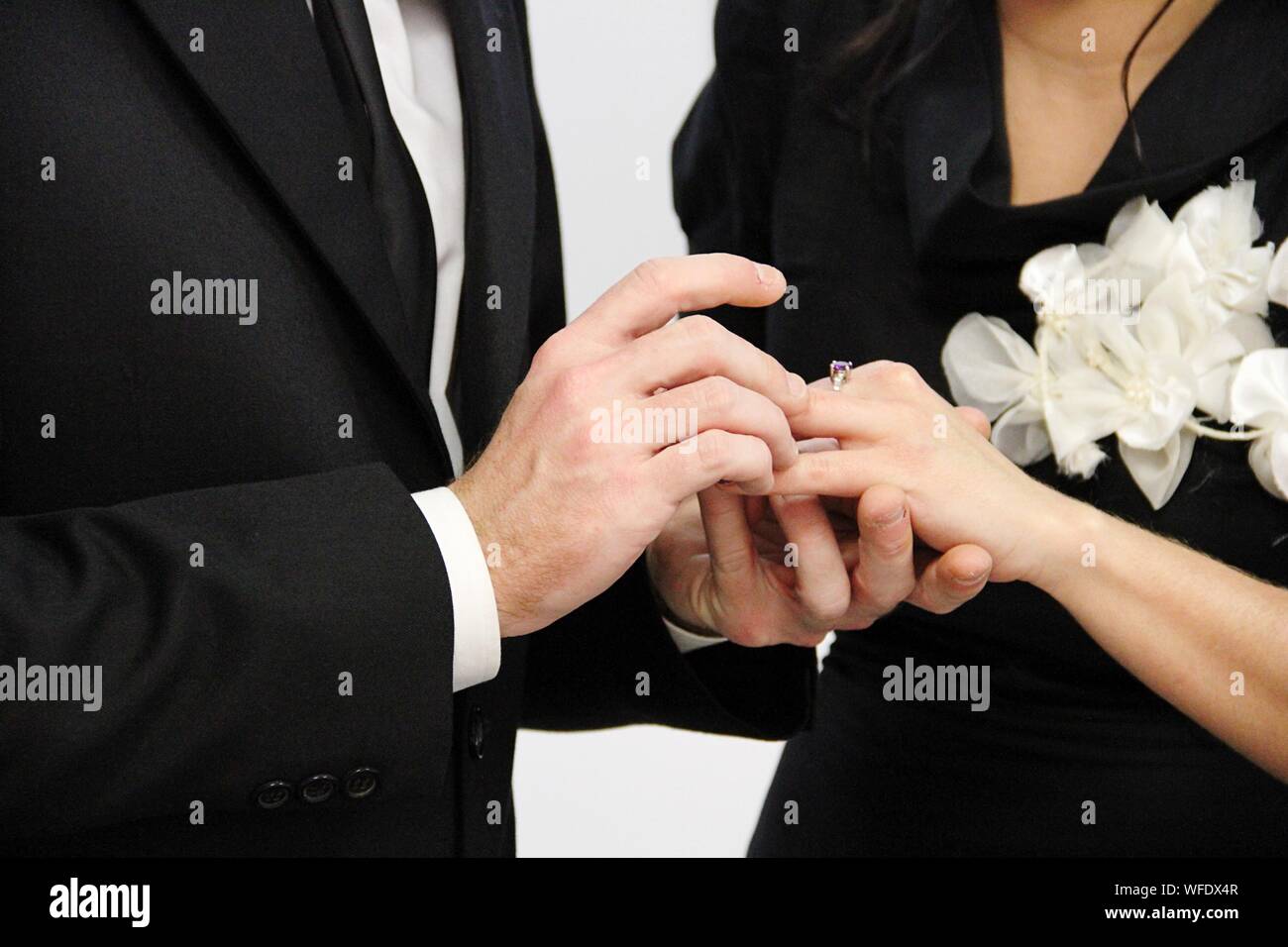 Wedding ring in hand hi-res stock photography and images - Alamy