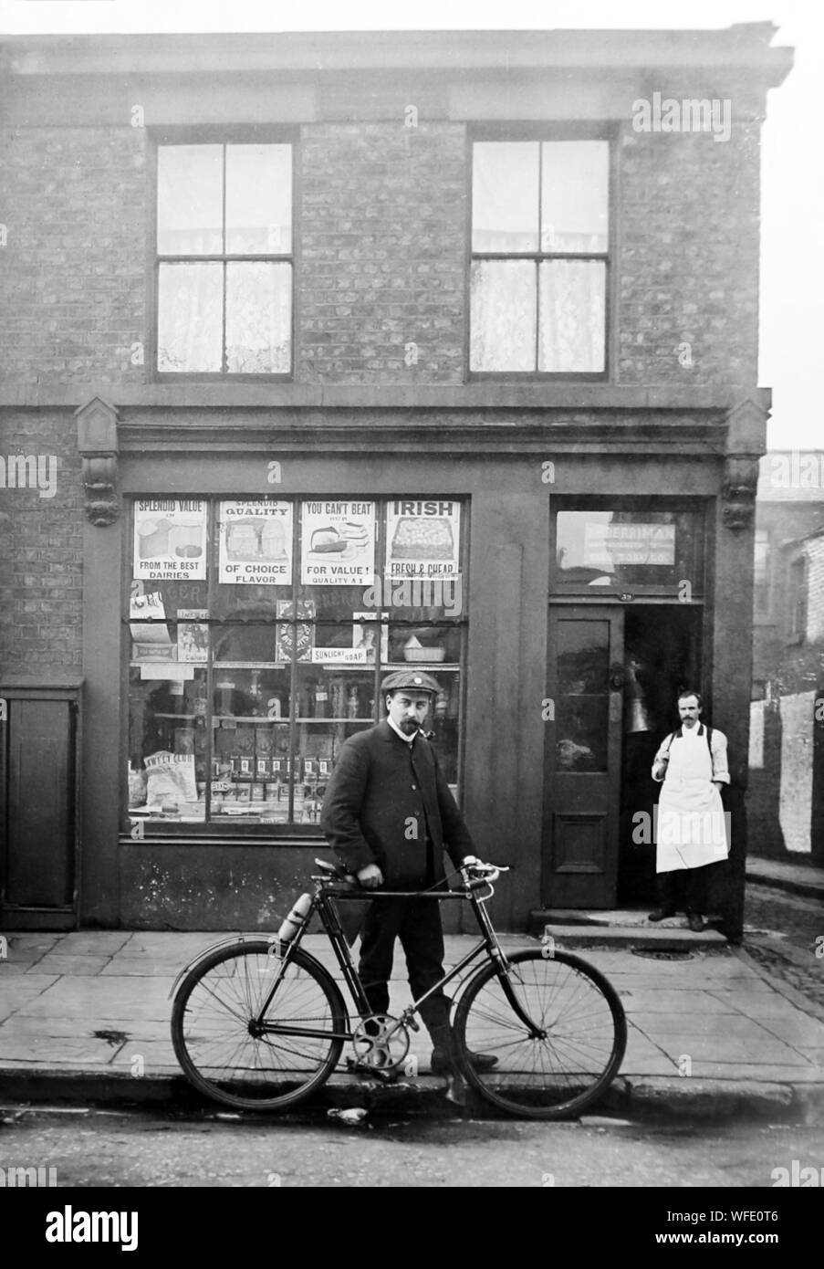 Grocery shop and cyclist in Rawtenstall, early 1900s Stock Photo - Alamy