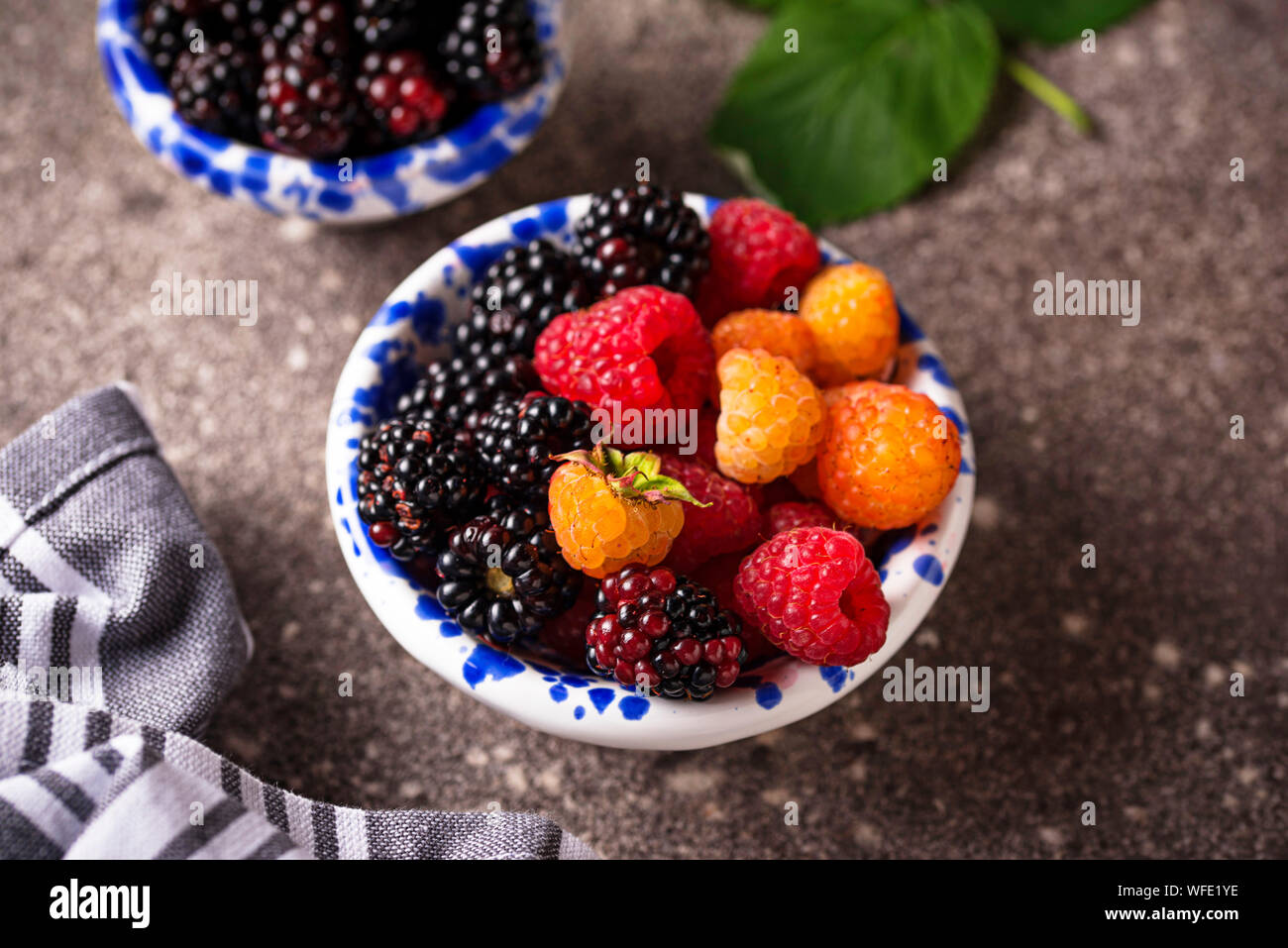 Red, black and yellow raspberry Stock Photo - Alamy