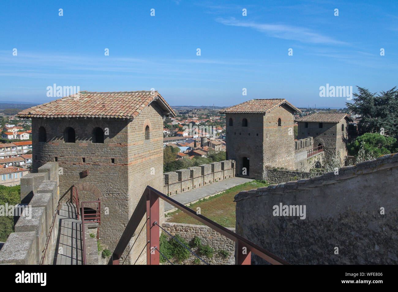 Carcassonne, France. Walkway on top of historic crenellated battlements ...