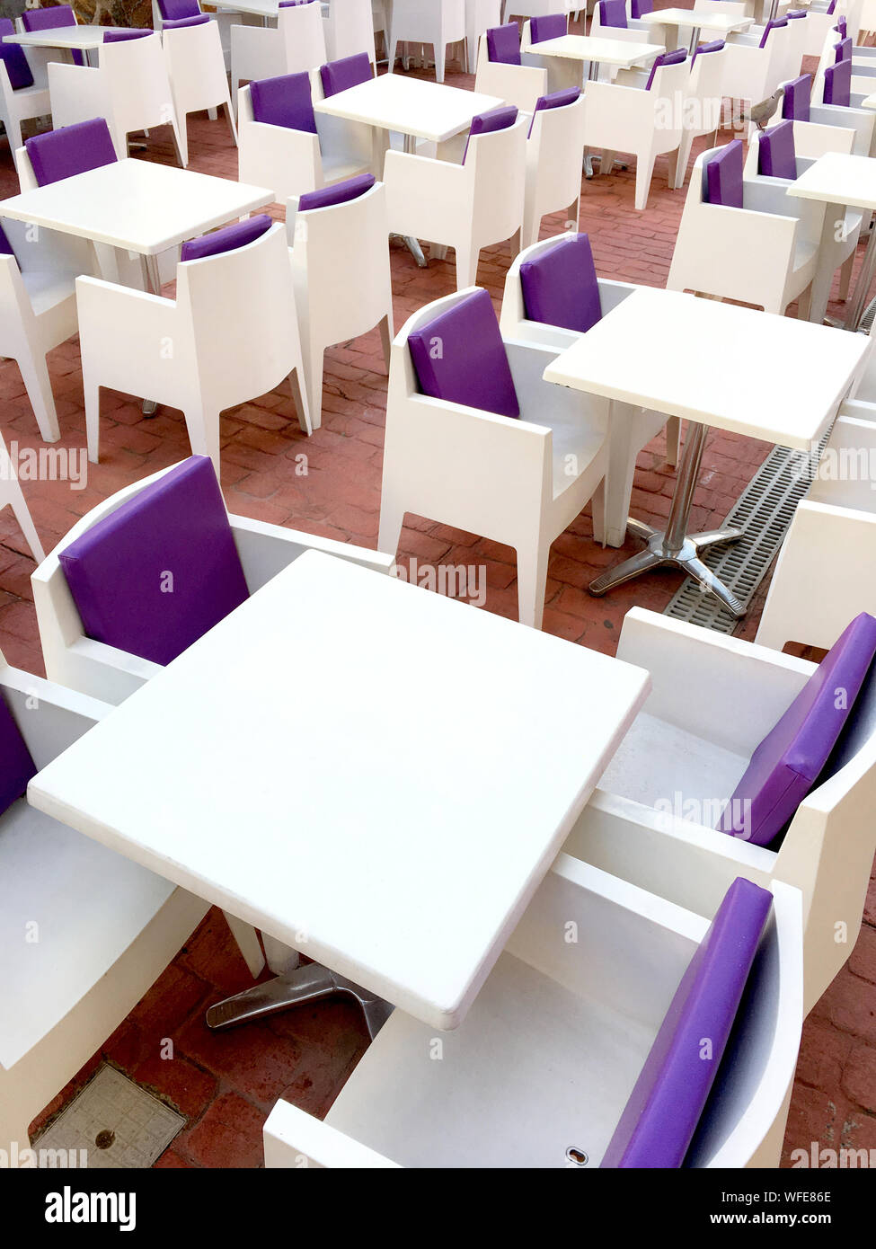Small restaurant table chairs hi-res stock photography and images - Alamy