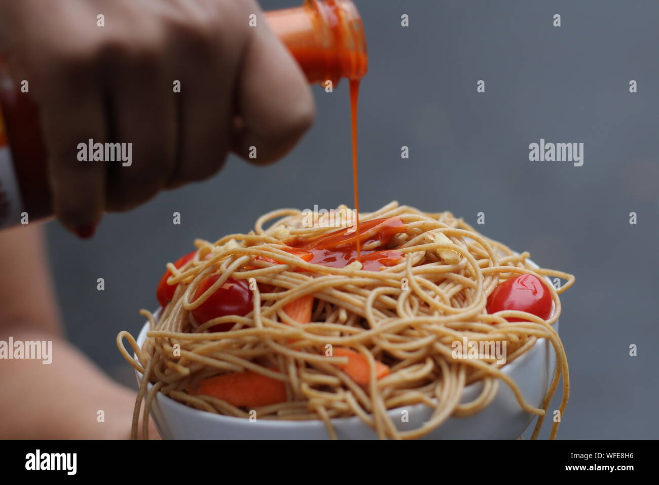 Pouring sauce hi-res stock photography and images - Alamy