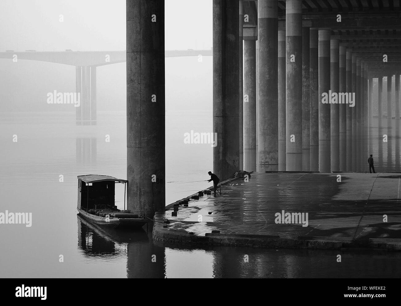 Waterfront jetty Black and White Stock Photos & Images - Alamy