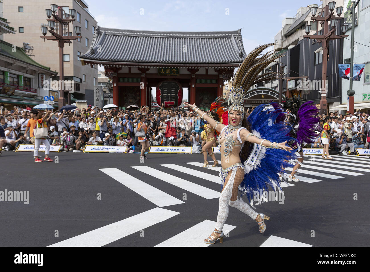 Tokyo, Japan. 31st Aug, 2019. Samba dancers perform through the streets ...
