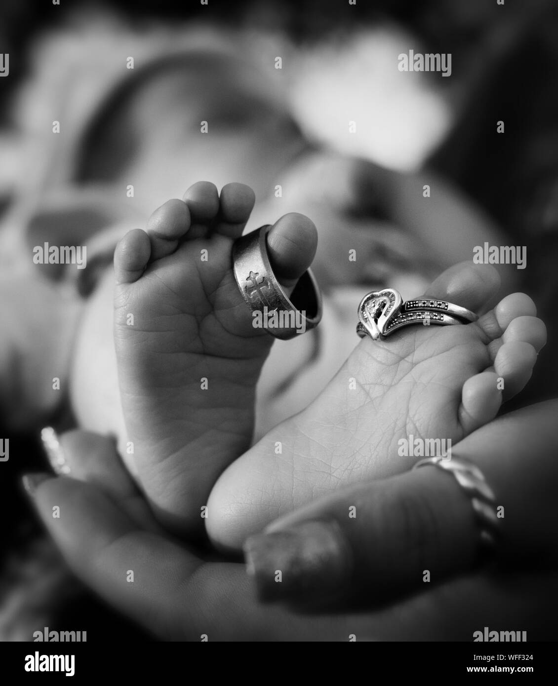 Baby hand holding finger ring hi-res stock photography and images - Alamy