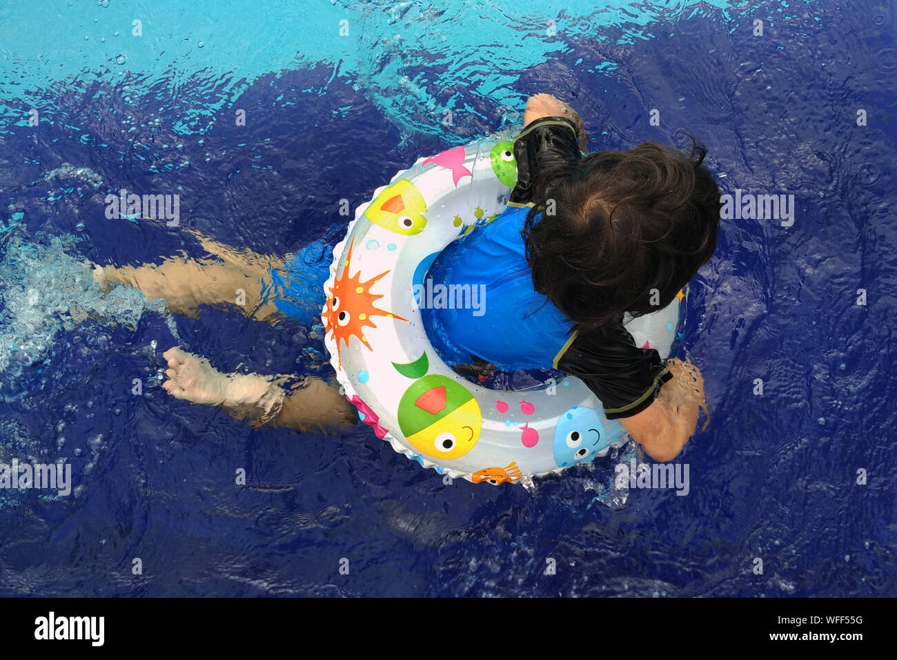 Boy with inflatable hi-res stock photography and images - Alamy