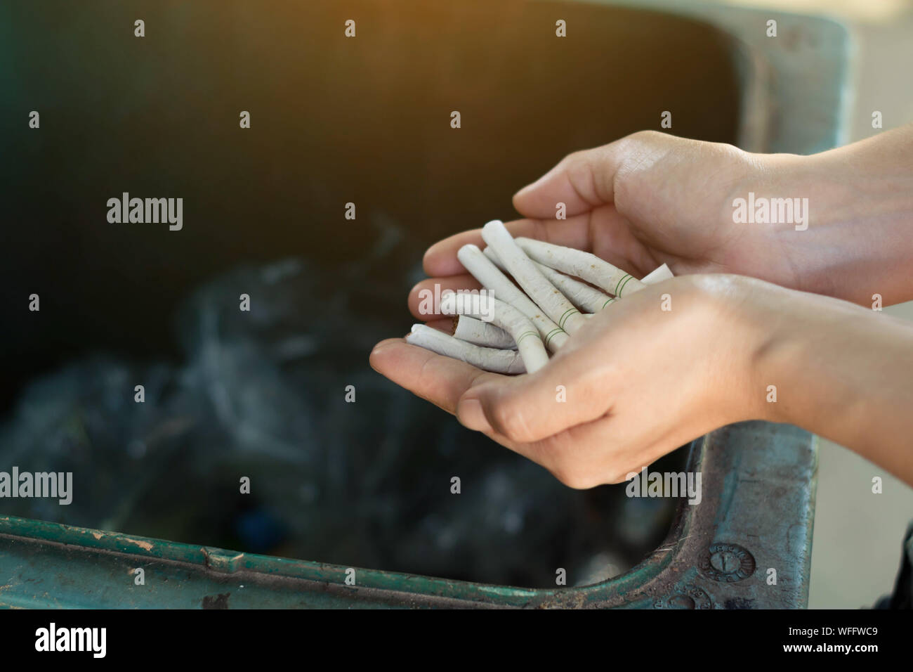 Throwing cigarettes hi-res stock photography and images - Alamy