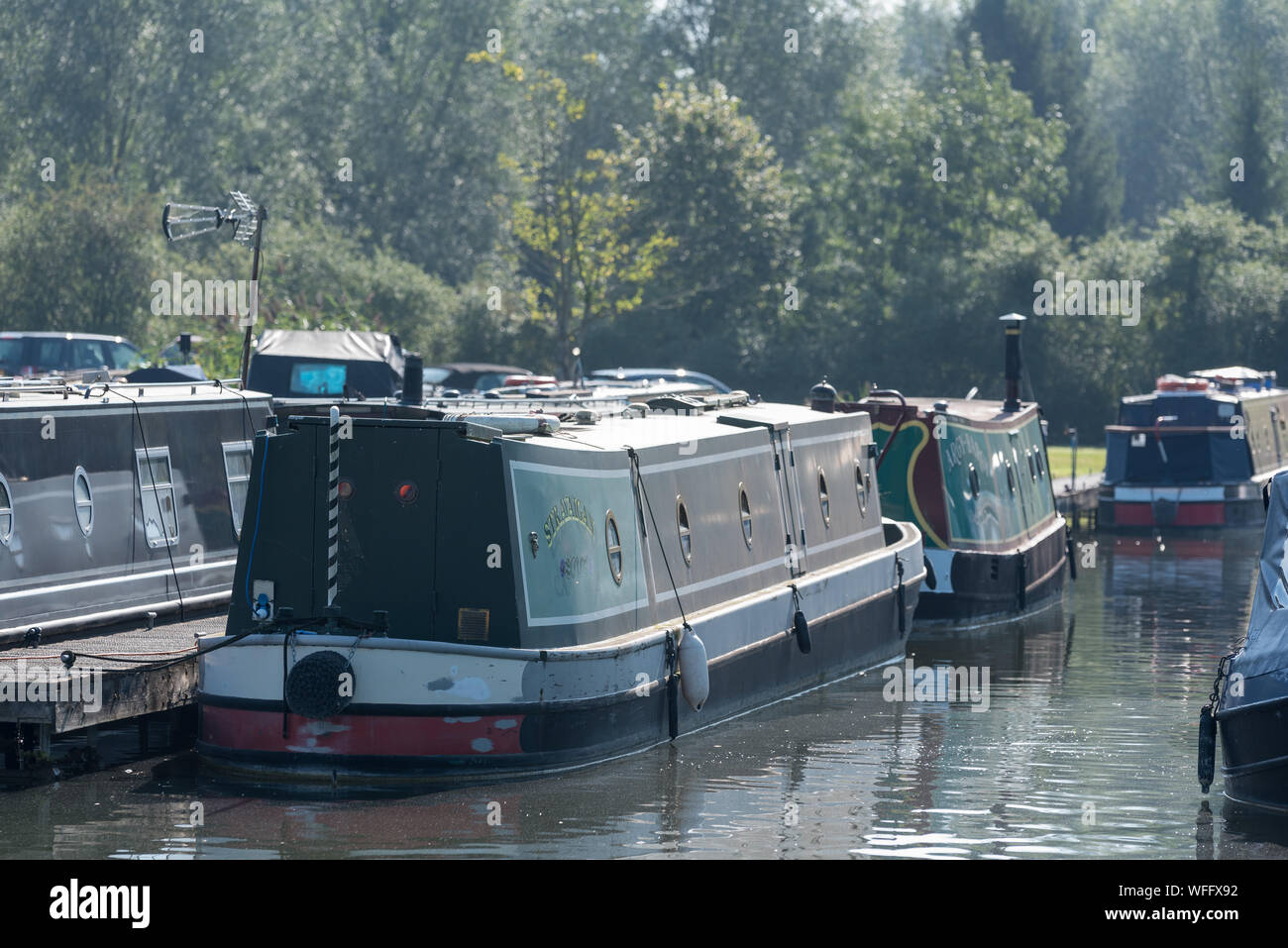 canal boat on british water aldermaston holiday Stock Photo - Alamy