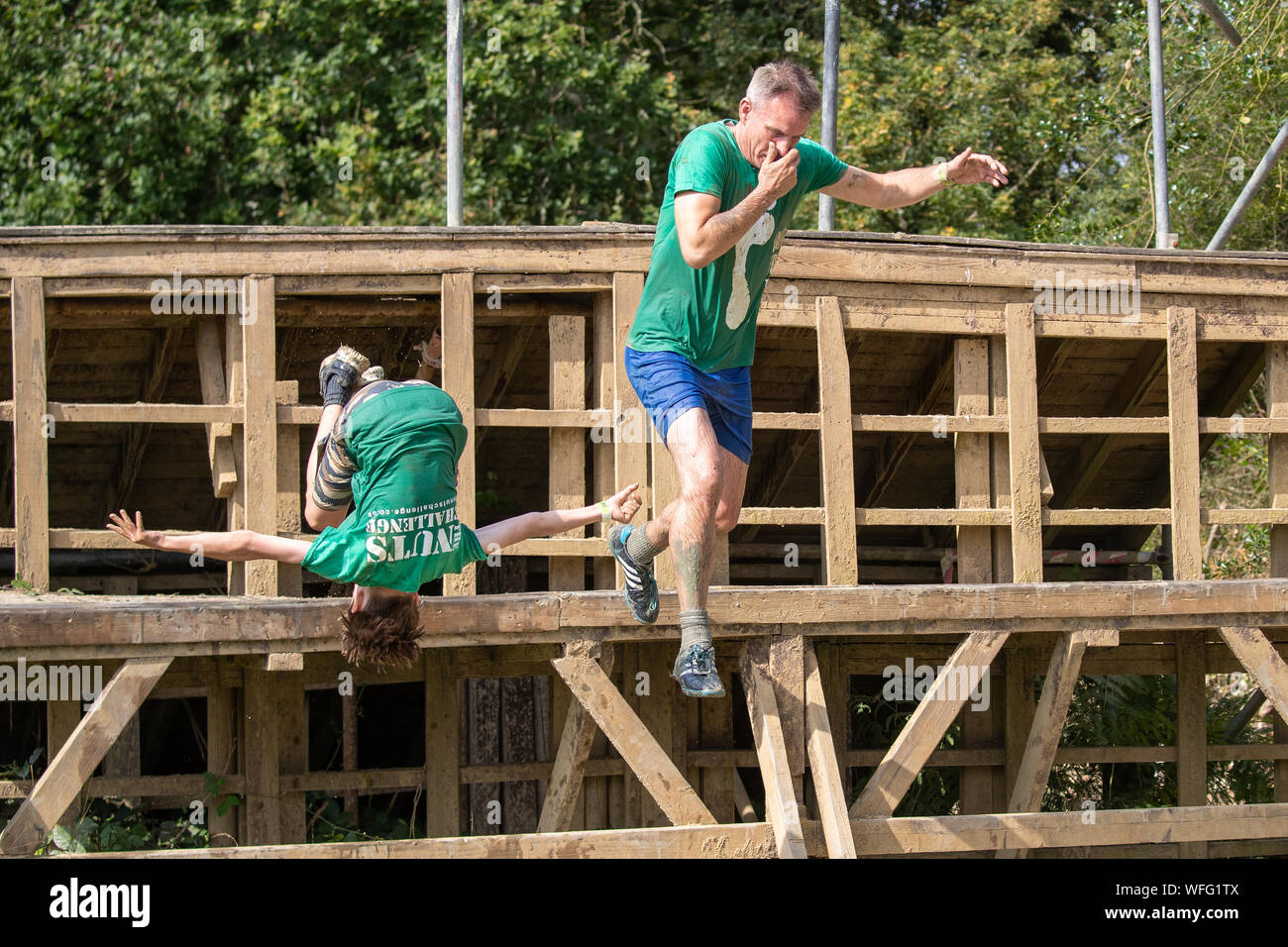 Dorking, UK. Saturday 31 August 2019. participants tackle the ...