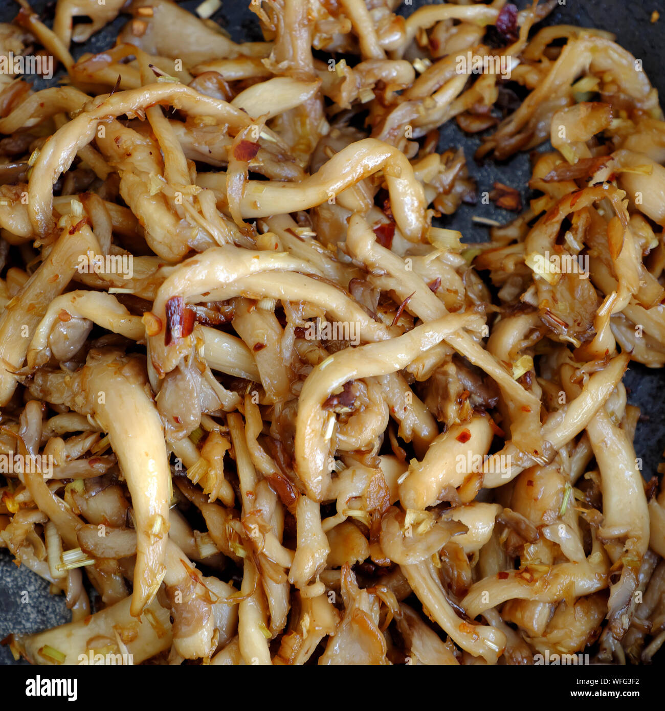 Vietnamese vegan food, abalone mushroom fry with lemongrass chopped ...