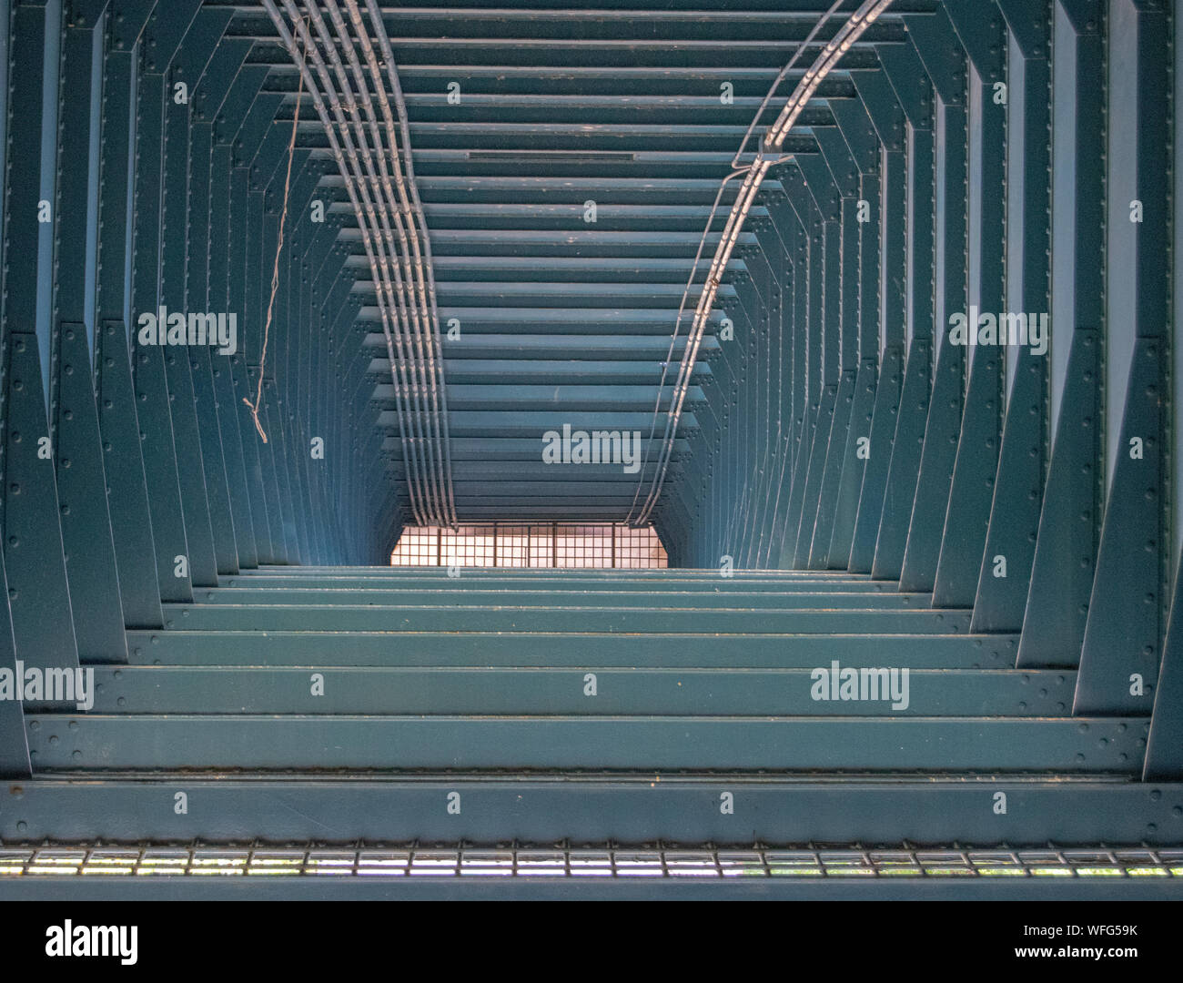 steel cage under a bridge Stock Photo - Alamy
