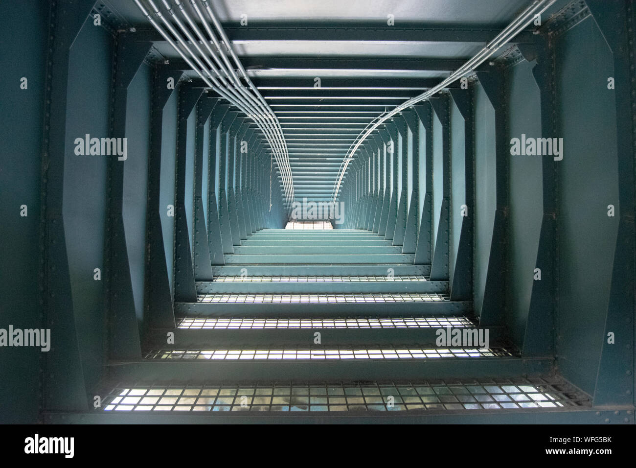 steel cage under a bridge Stock Photo - Alamy