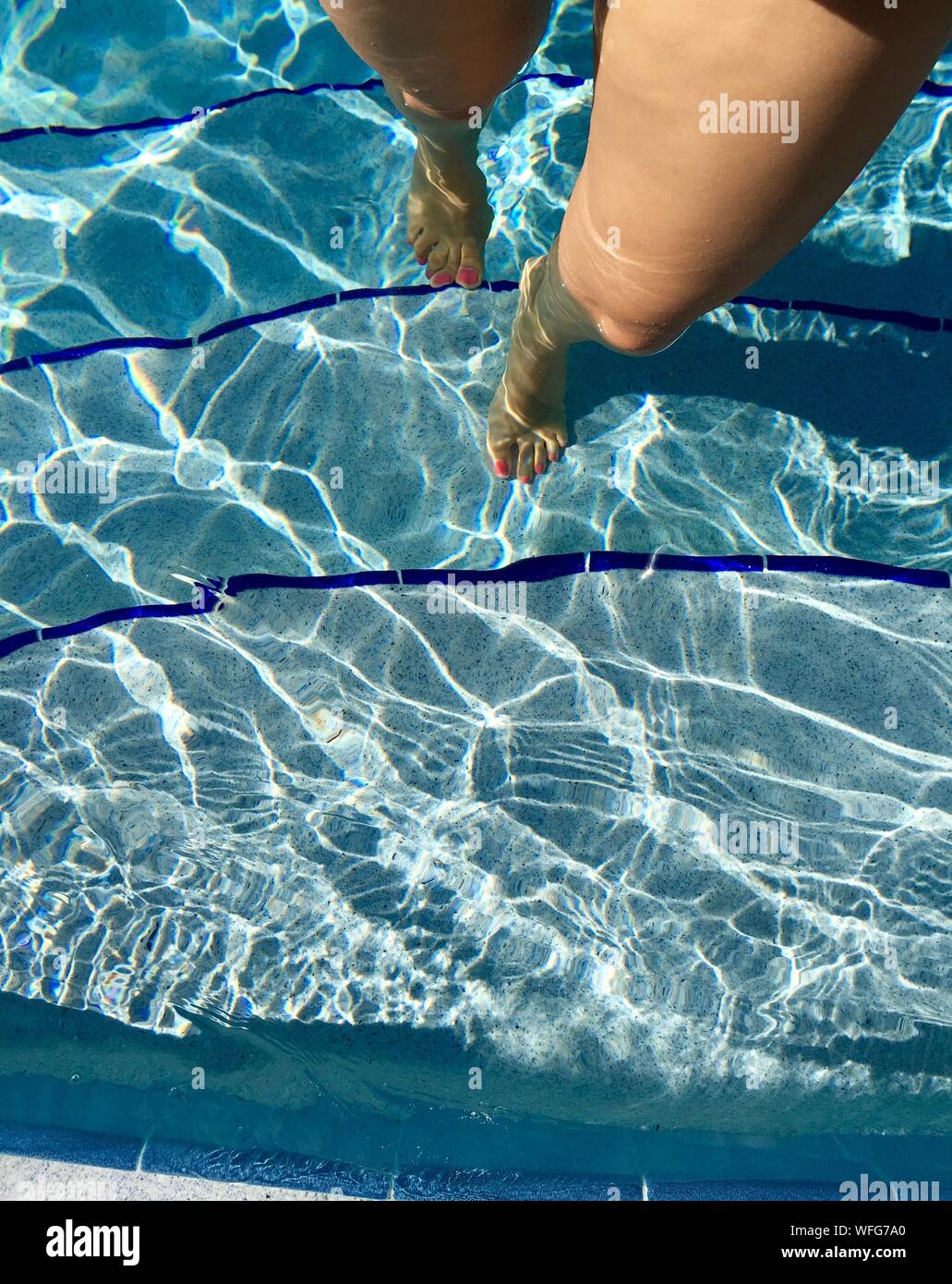 Woman pool swimming walking hi-res stock photography and images - Alamy