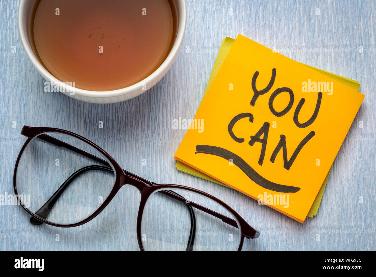 You can motivational reminder - handwriting on a sticky note with cup ...
