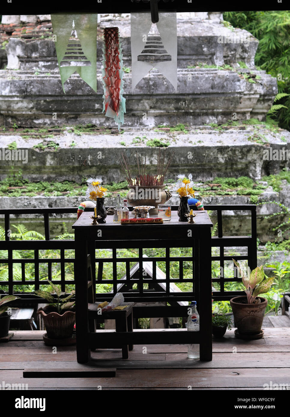 Offering offerings shrine religious hi-res stock photography and images ...
