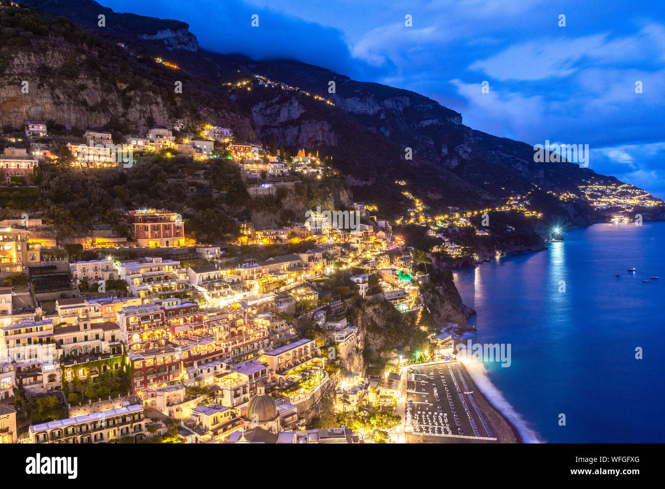 Italy, Positano, panorama of houses and beach in the evening Stock ...