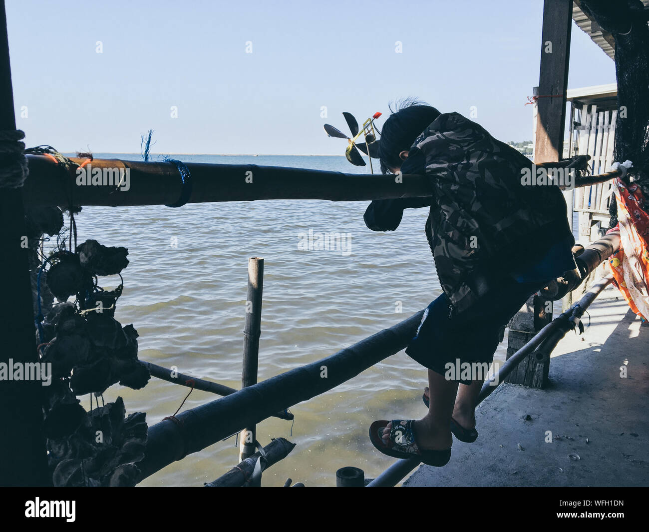 Boy rear view boat hi-res stock photography and images - Alamy