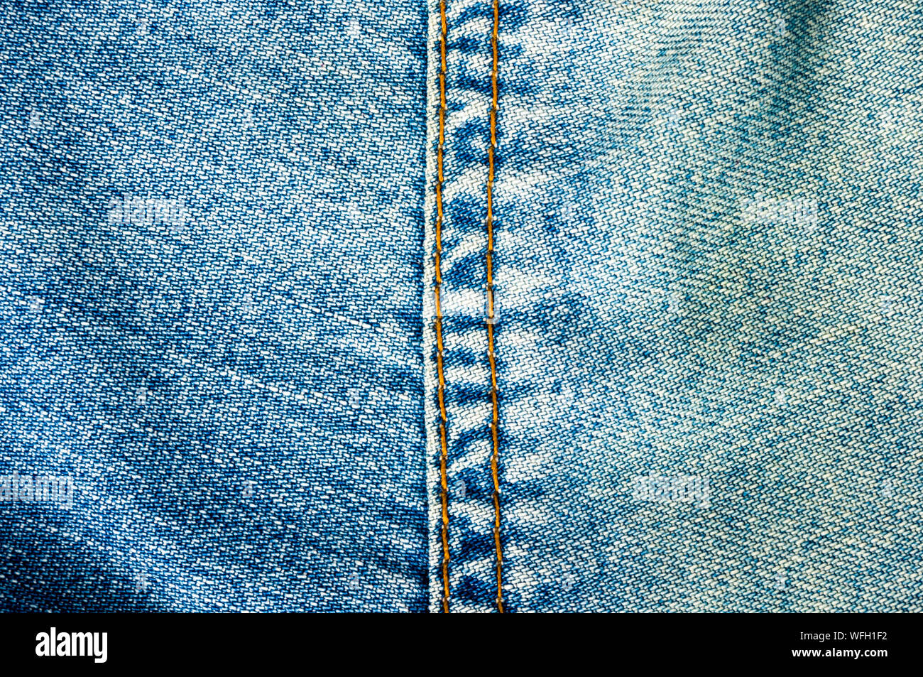 clothing items blue washed faded jeans cotton fabric texture with seams ...