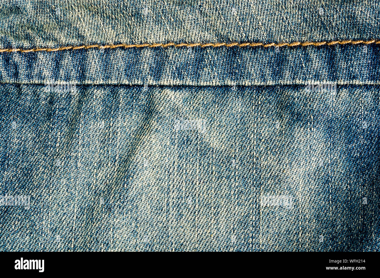 clothing items blue washed faded jeans cotton fabric texture with seams ...