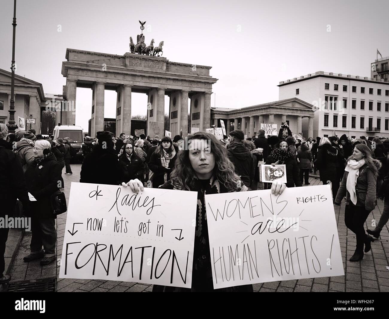 Women holding banners hi-res stock photography and images - Alamy