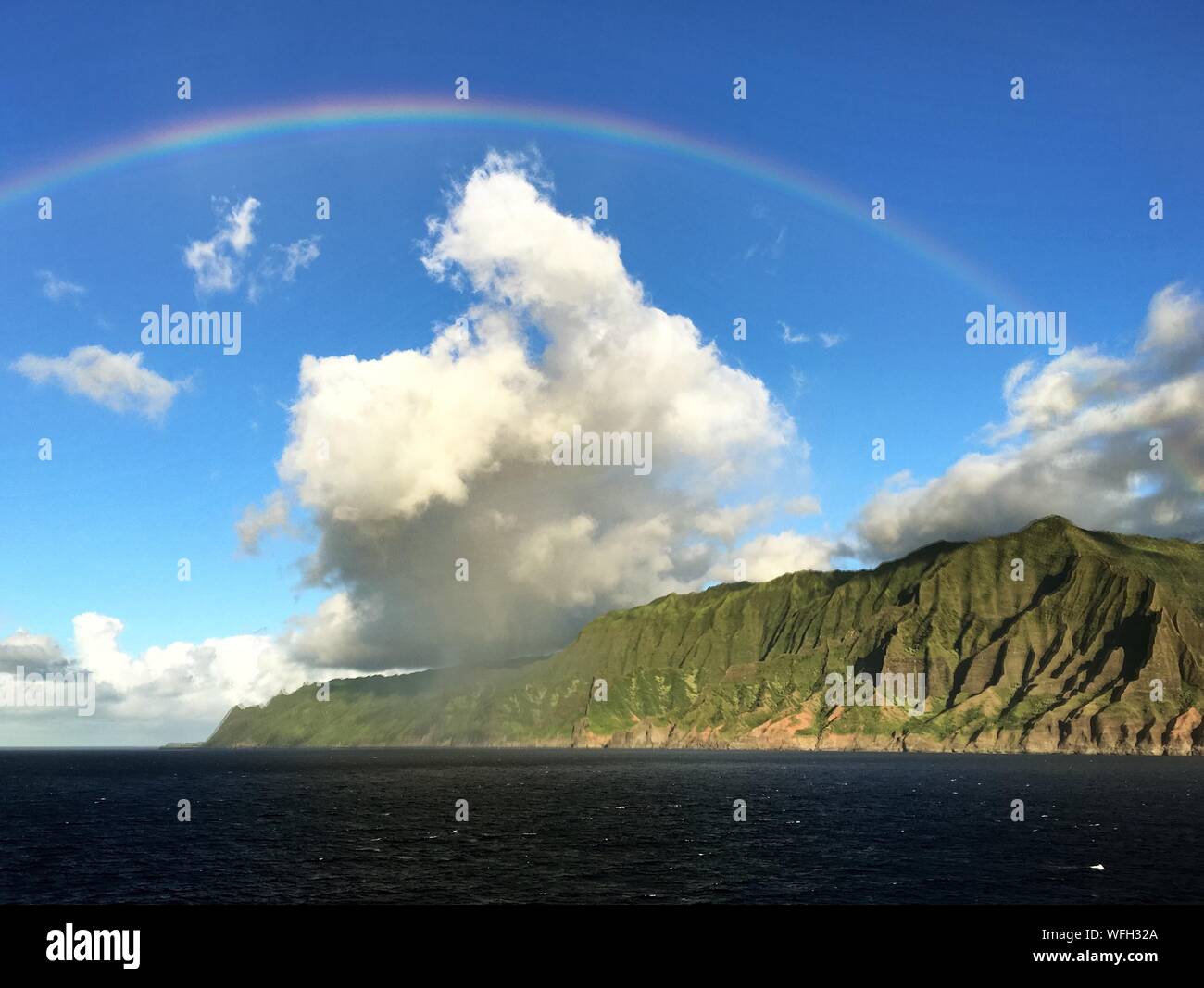 Rainbow on sea hi-res stock photography and images - Alamy