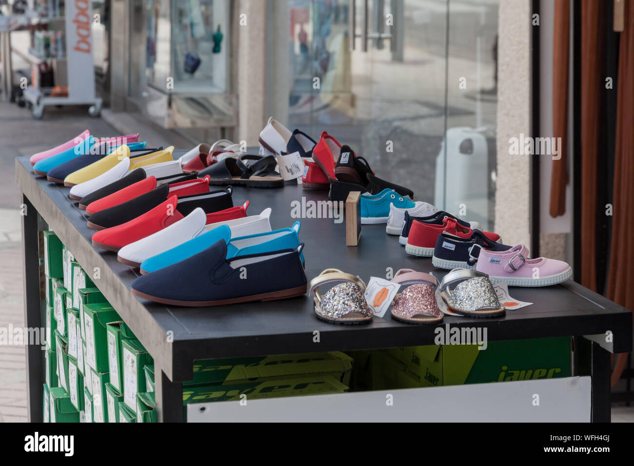 A collection shoes outside a shop Stock Photo - Alamy