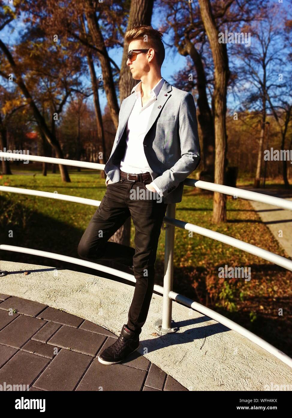 Leaning Railing Park High Resolution Stock Photography and Images - Alamy