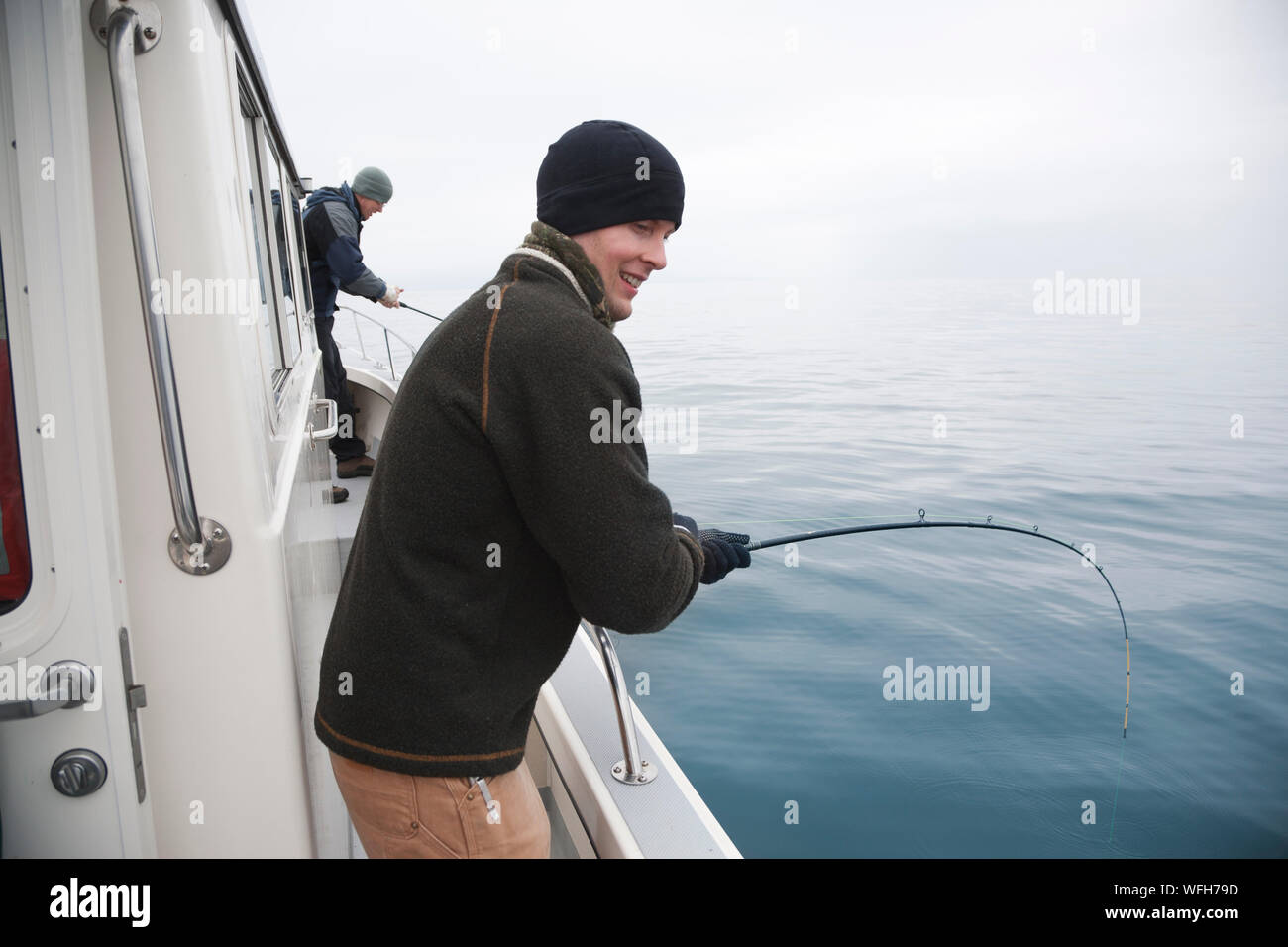Men on fishing boat hi-res stock photography and images - Alamy
