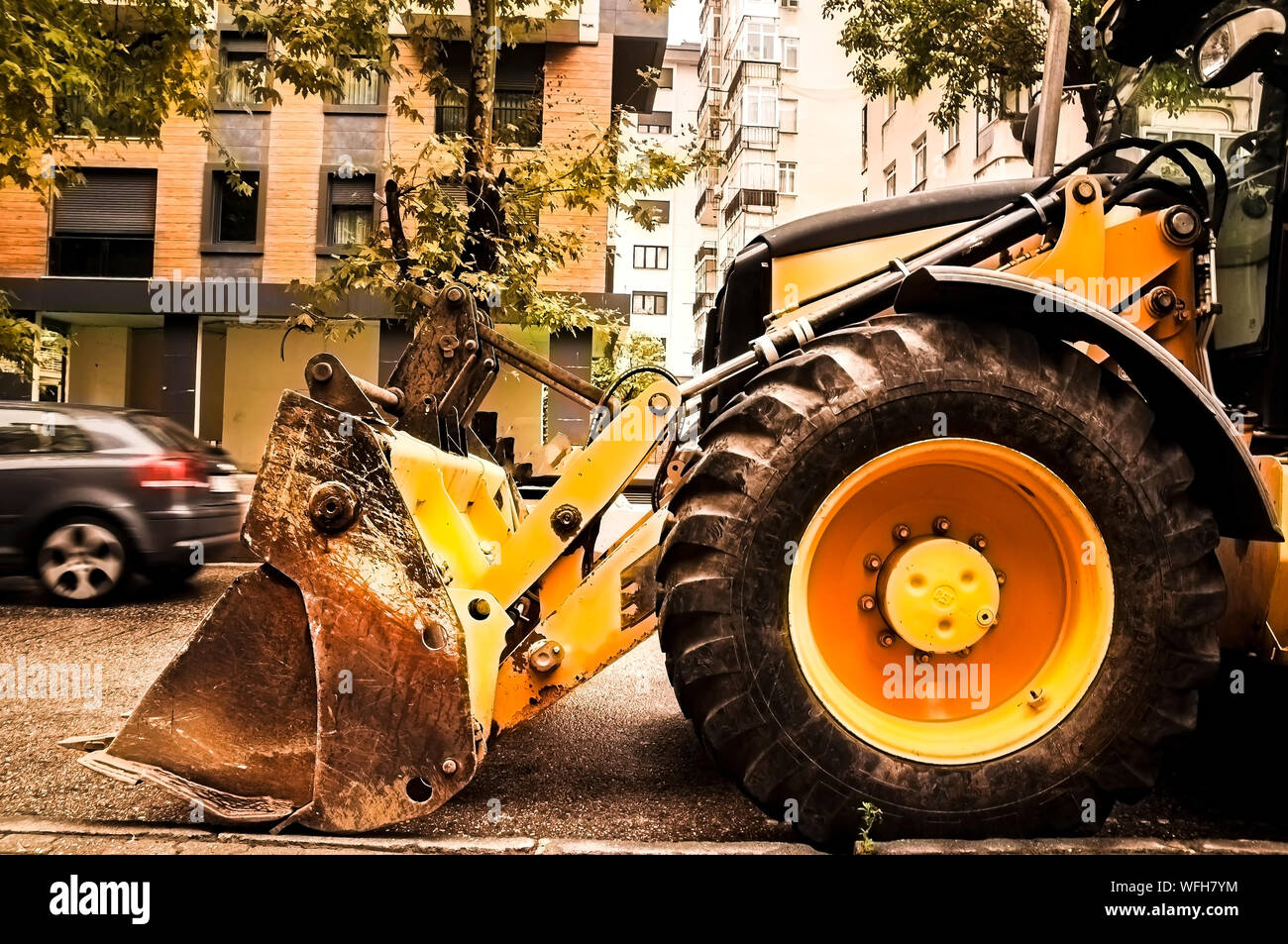 Excavation machine for digging soil and asphalt Stock Photo - Alamy
