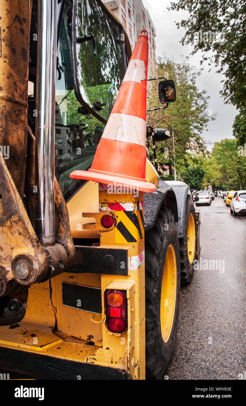 Excavation machine for digging soil and asphalt Stock Photo - Alamy