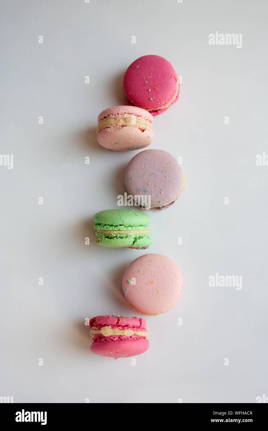 Colorful macarons isolated on white background Stock Photo - Alamy
