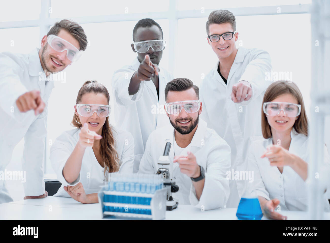 creative team of young scientists Stock Photo - Alamy