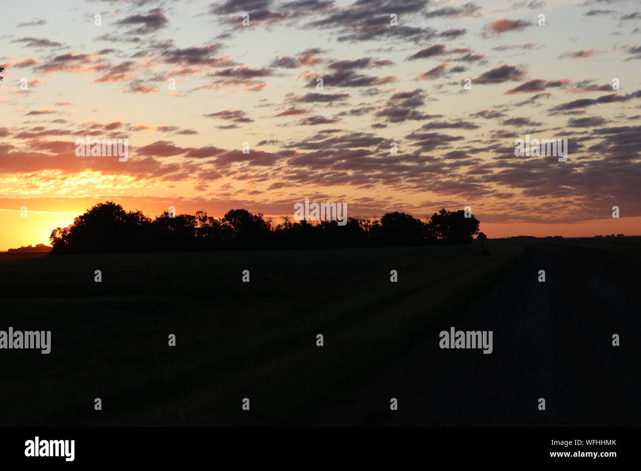 Sky on fire sunrise Stock Photo - Alamy