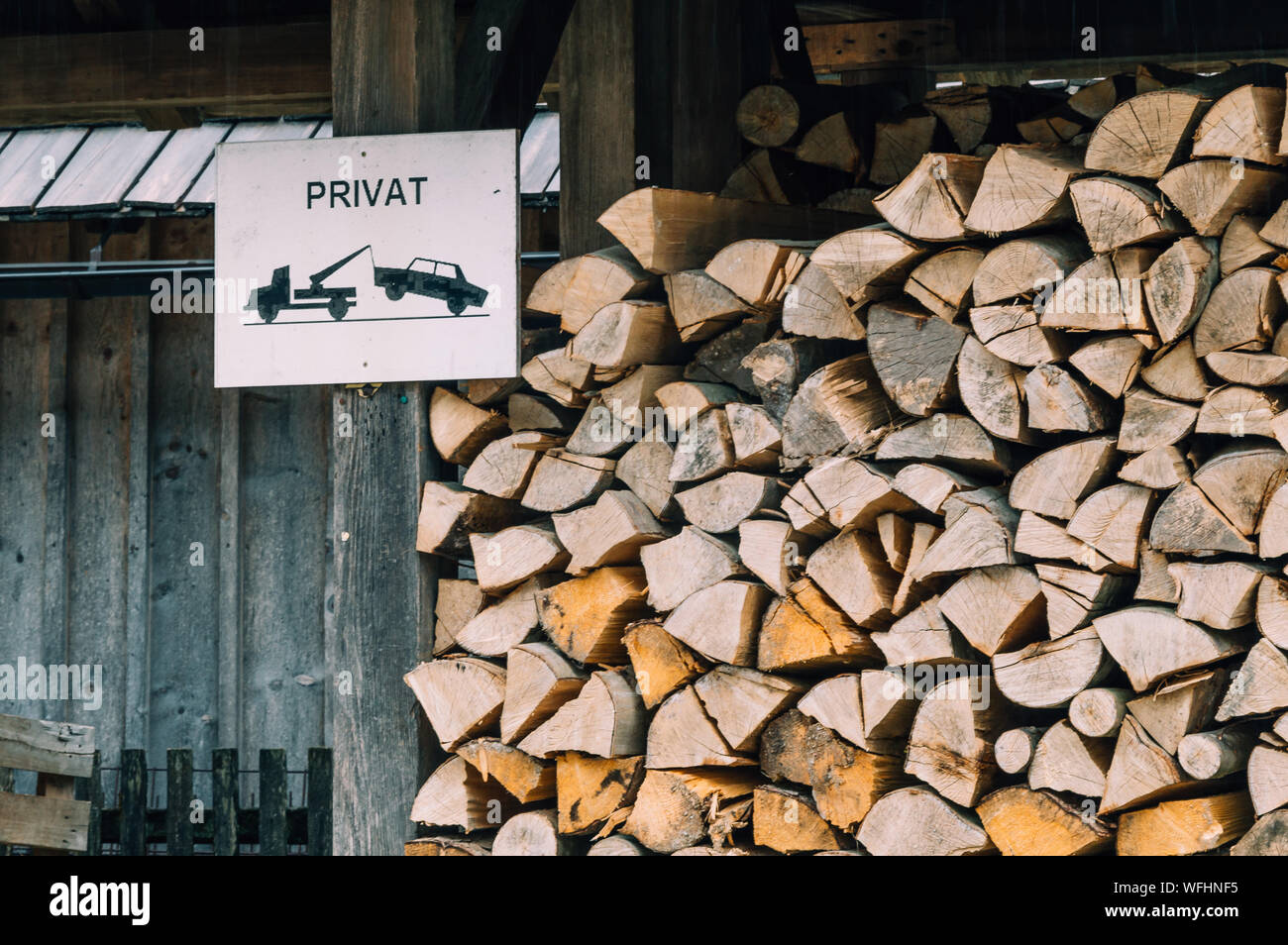 Information Sign By Logs Stock Photo - Alamy