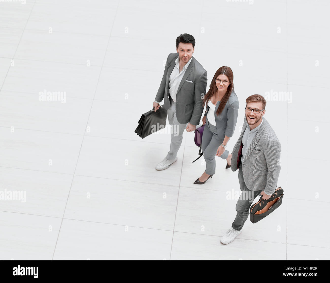 Business people colleagues employees go hi-res stock photography and ...