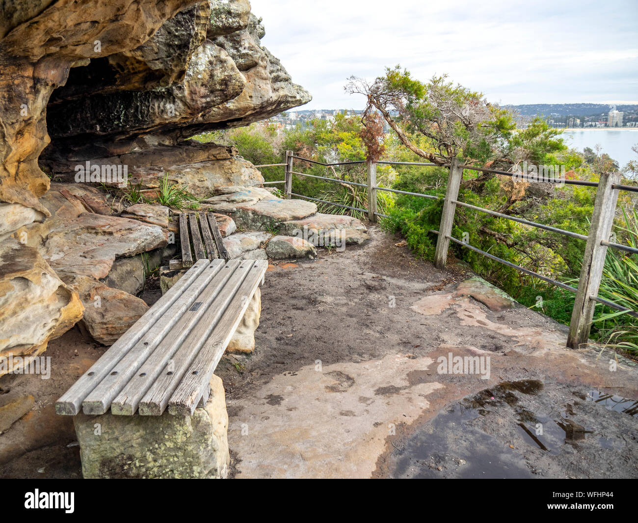 Wooden bench on Manly Headland lookout over Manly Beach and Pacific ...