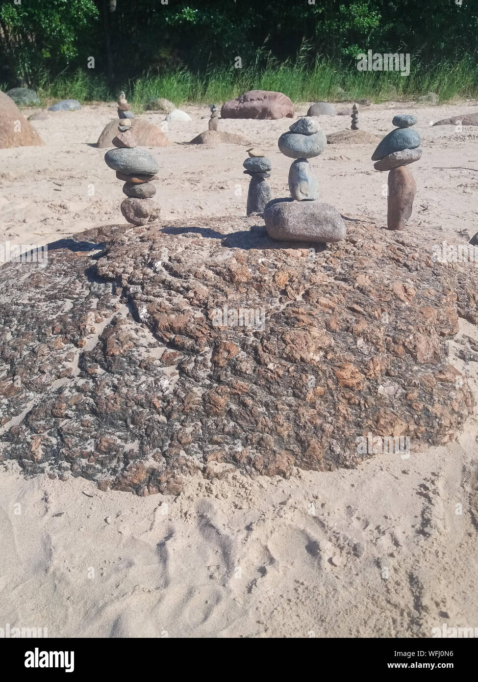 Figures made of stones on the beach, beach activities, recreation ...