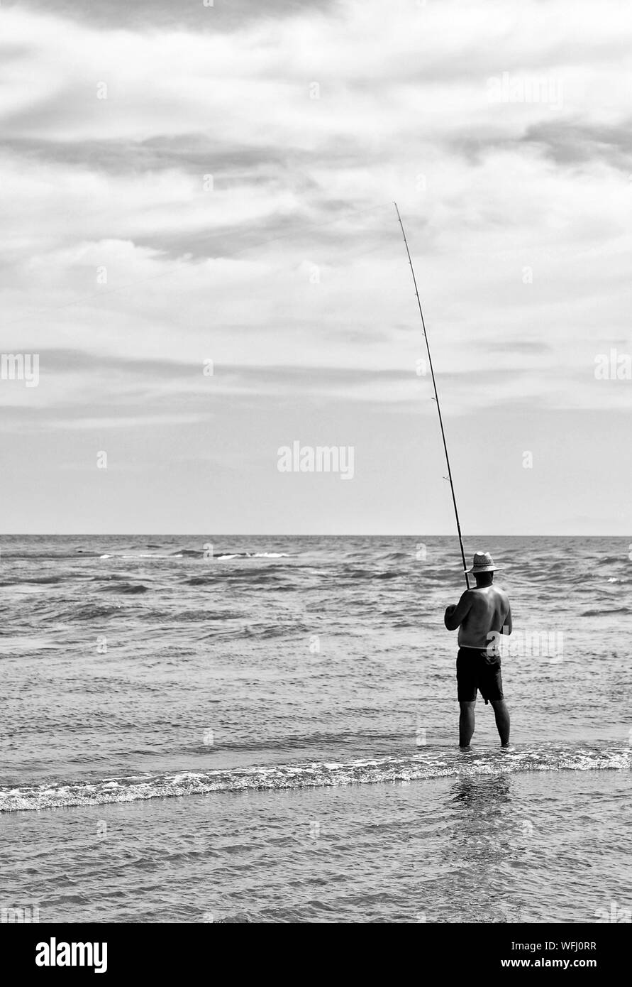 Fisherman at sea Stock Photo - Alamy