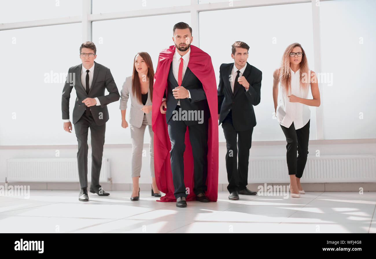 businessman superhero and his business team are stepping together Stock ...