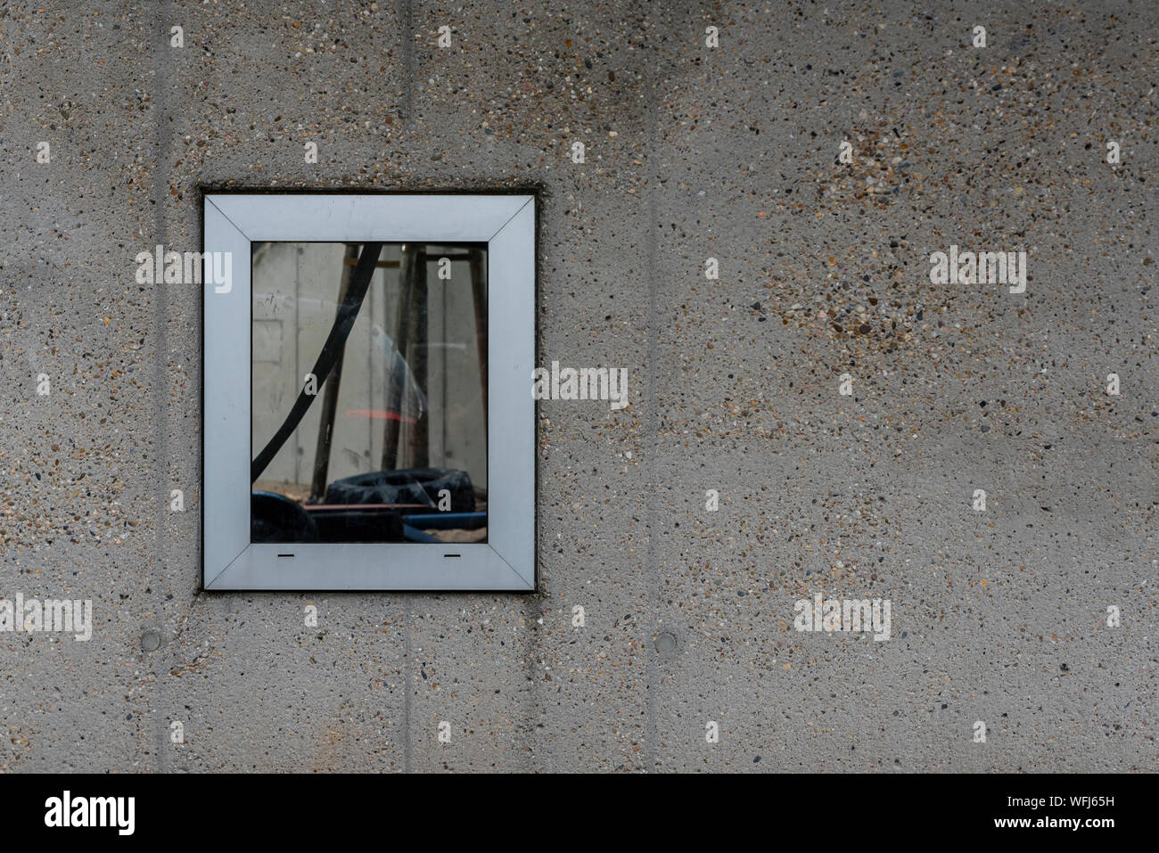 One Window on a bare Facade, Small Window on a Wall, bare Wall with a ...