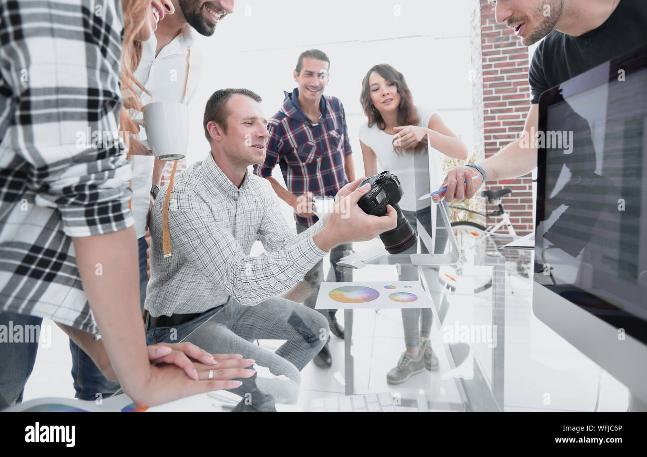 group photo of editors working in a modern office Stock Photo - Alamy