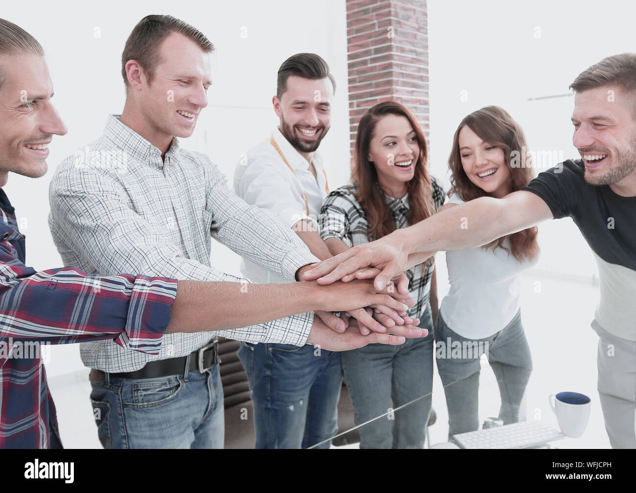 closeup .the design team shows their success Stock Photo - Alamy